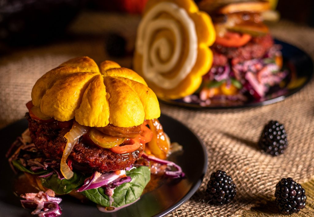 Vegan autumn burger - meaty patty with cole slaw in a pumpkin bun ...