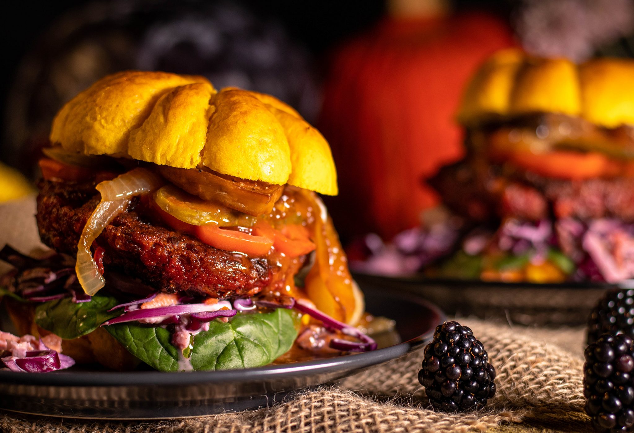 Vegan autumn burger - meaty patty with cole slaw in a pumpkin bun ...