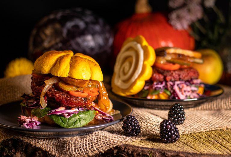 Vegan autumn burger - meaty patty with cole slaw in a pumpkin bun ...